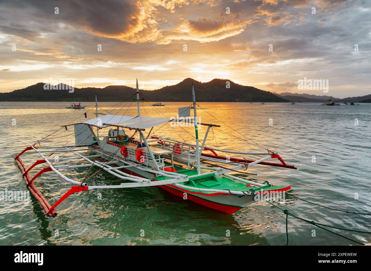 Traditional boats at sunset. Philippines Stock Photo - Alamy