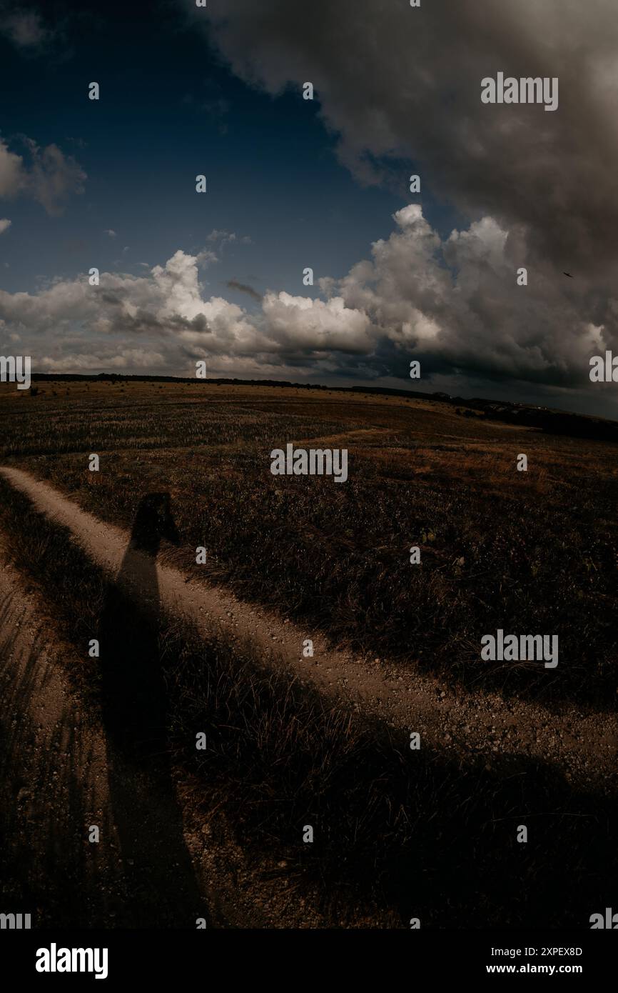 Countryside Path Under a Dramatic Sky Stock Photo - Alamy