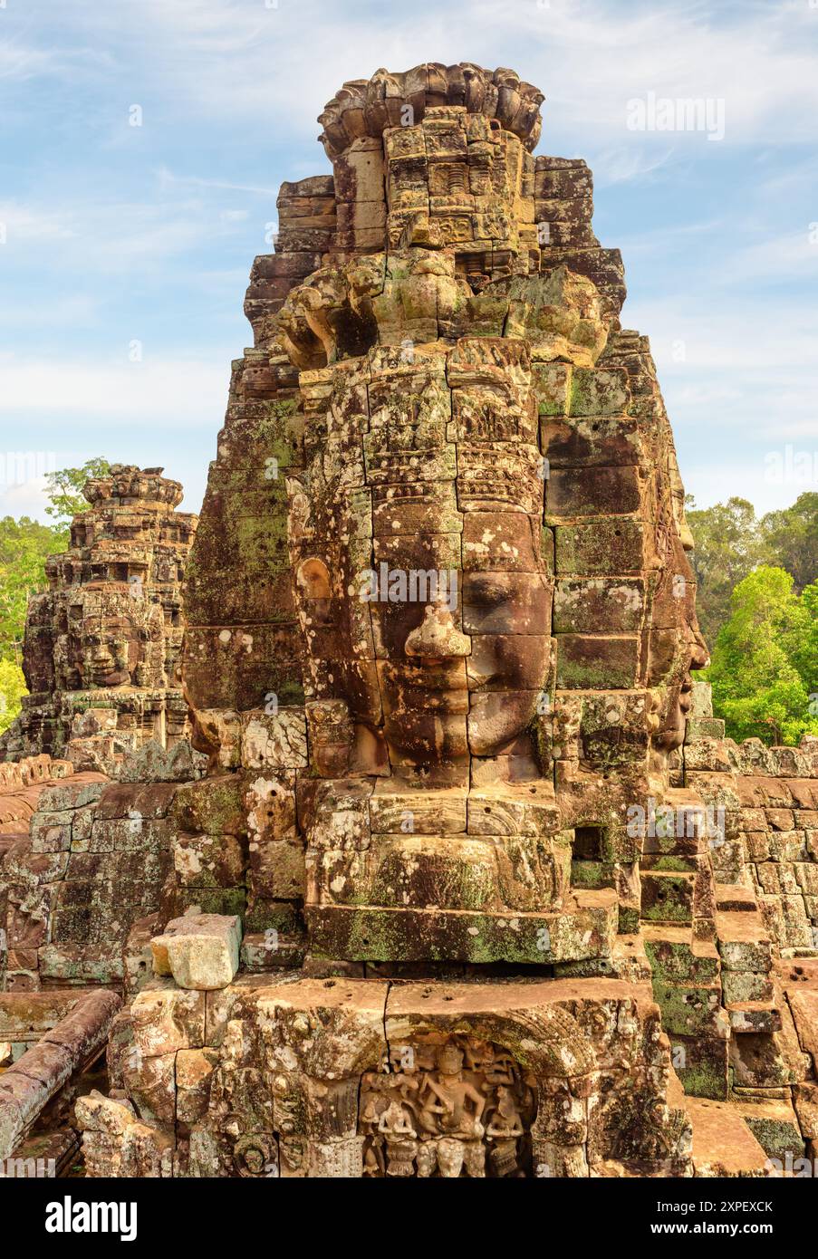 Amazing view of towers with stone faces of Bayon temple Stock Photo - Alamy