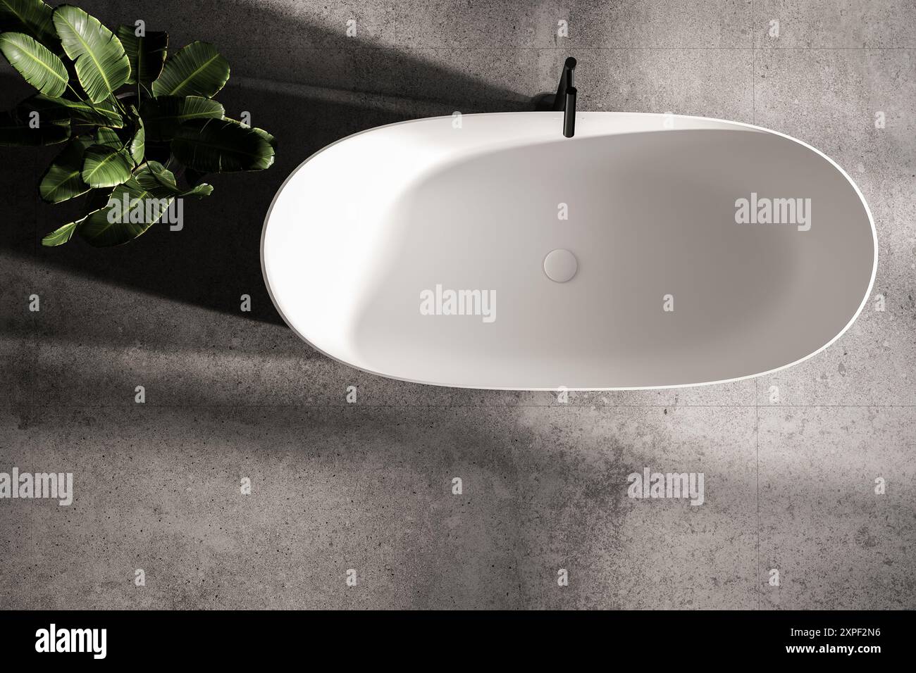 Top view of white bathtub on concrete floor in modern bathroom and ...