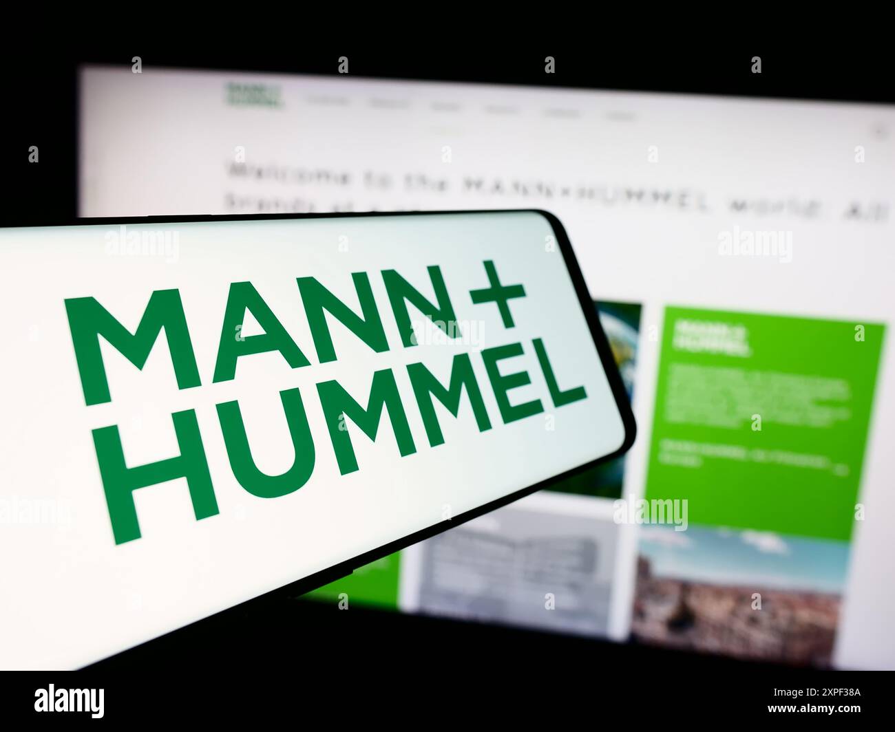 Mobile phone with logo of German company Mann Hummel International GmbH ...