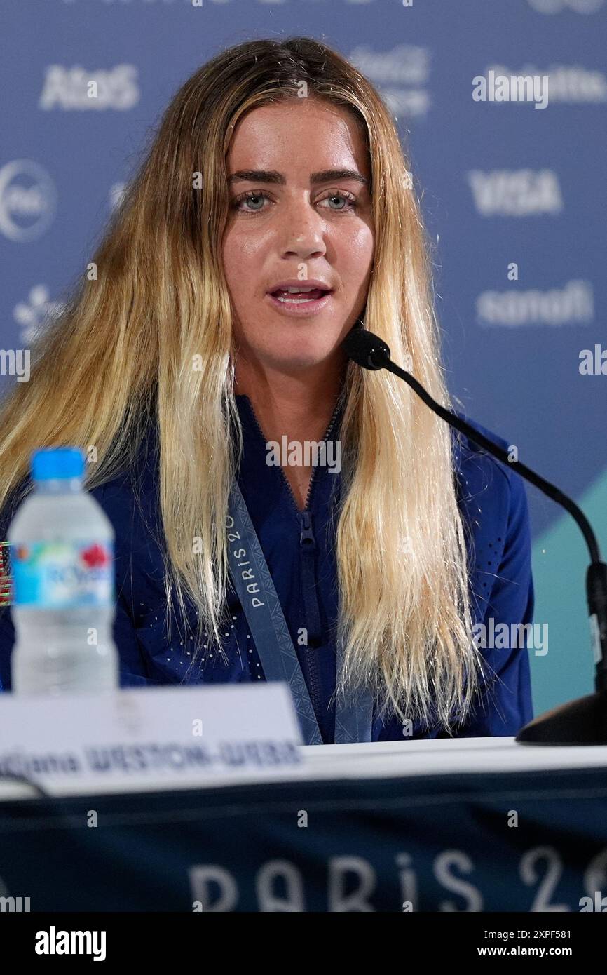 Caroline Marks, of the United States, speaks at a news conference after ...