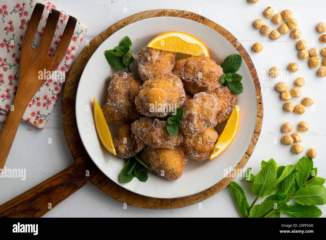 Delicious traditional Spanish fritters. Table decorated with Christmas ...