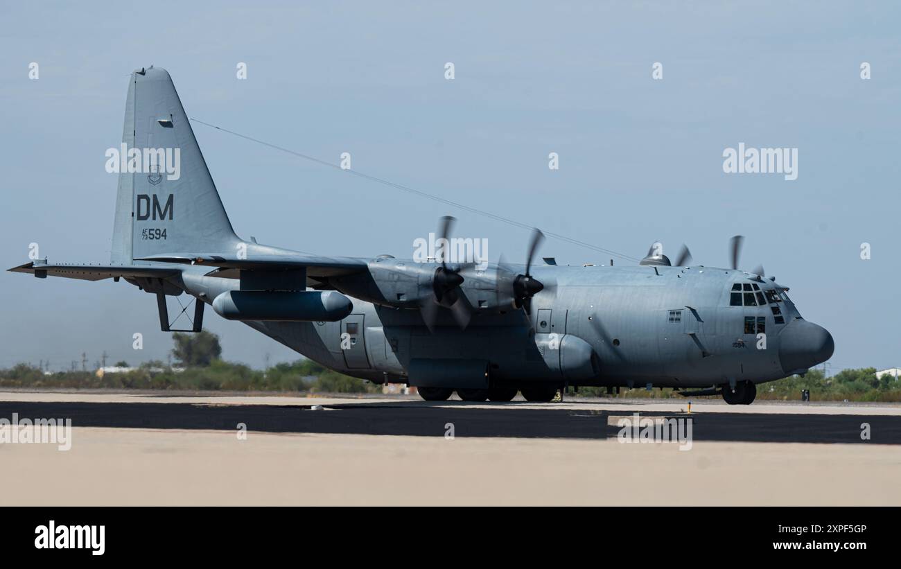 A U.S. Air Force EC-130H Compass Call aircraft taxis on the flightline ...