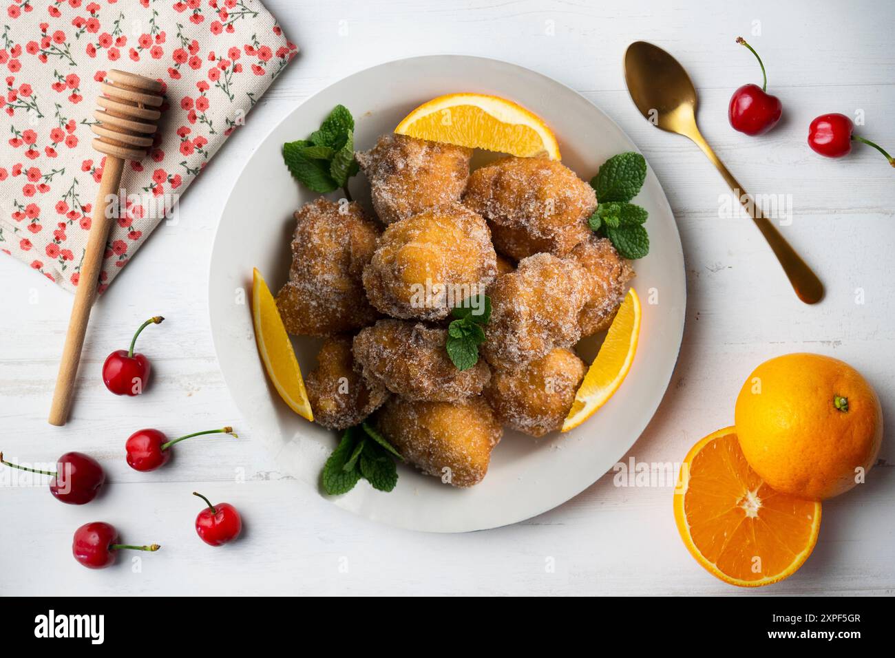 Delicious traditional Spanish fritters. Table decorated with Christmas ...