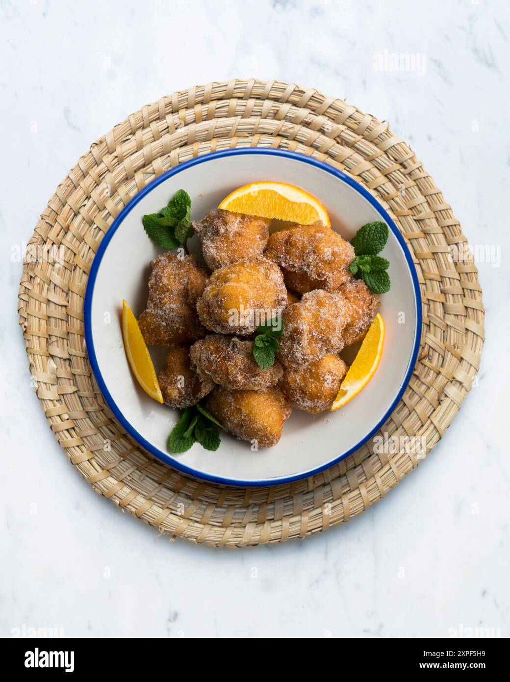 Delicious traditional Spanish fritters. Table decorated with Christmas ...