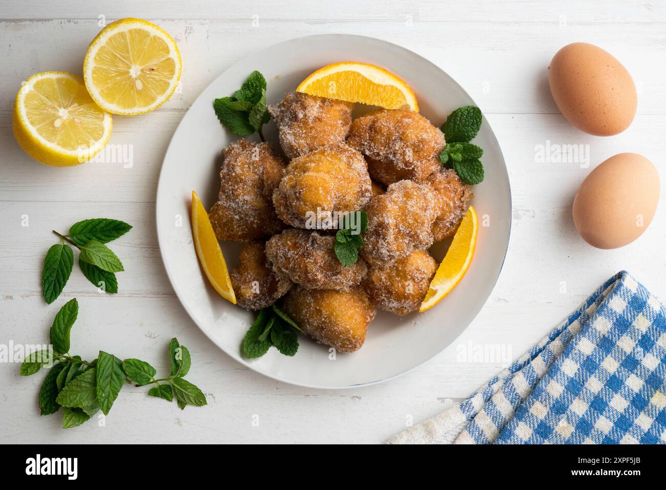 Delicious traditional Spanish fritters. Table decorated with Christmas ...