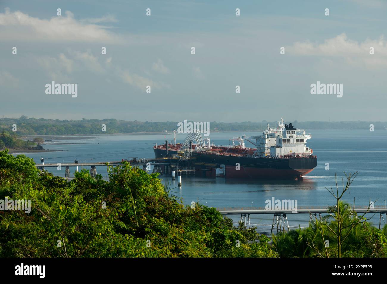 Crude oil tanker discharging crude oil to storage tanks in Chiriqui ...