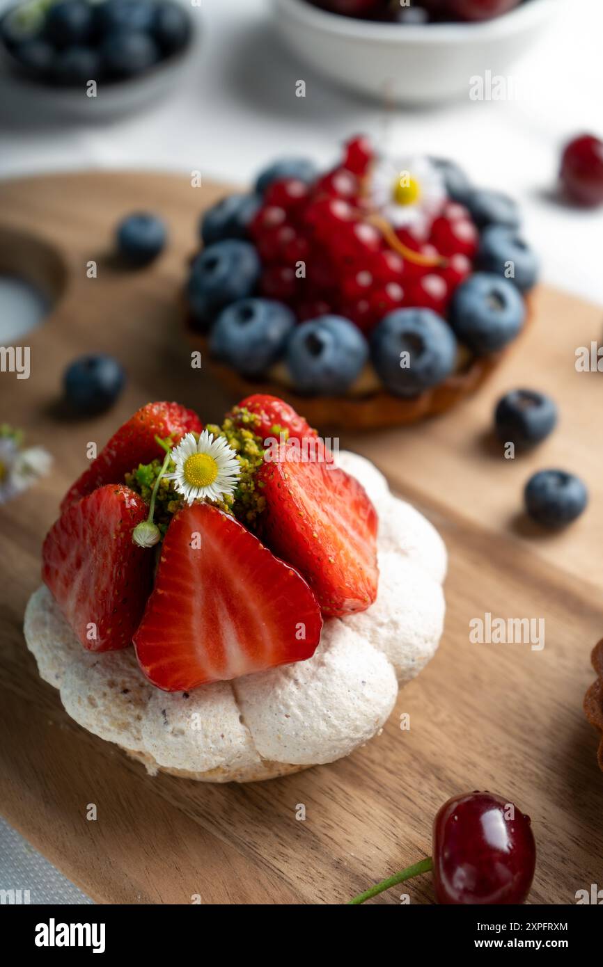 Berry Desserts Assortment, Seasonal French Style Pastry over Bright ...
