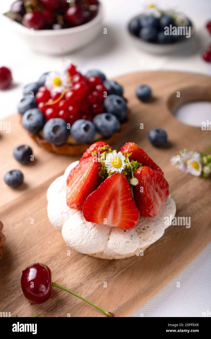 Berry Desserts Assortment, Seasonal French Style Pastry over Bright ...