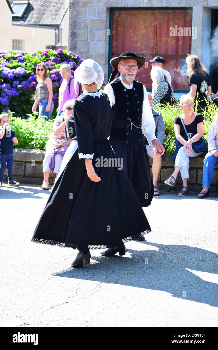 Traditional Breton Fest-Noz folk dancers with members of the public in ...