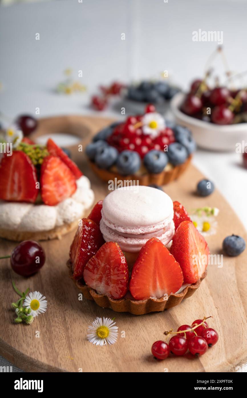 Berry Desserts Assortment, Seasonal French Style Pastry over Bright ...