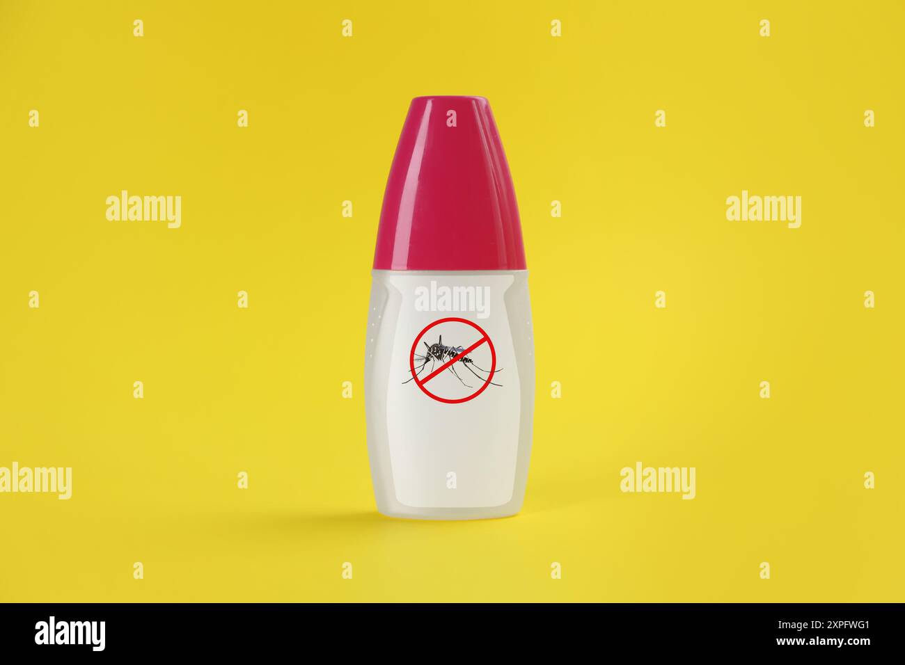 Mosquito spray on yellow background. Insect repellent Stock Photo - Alamy