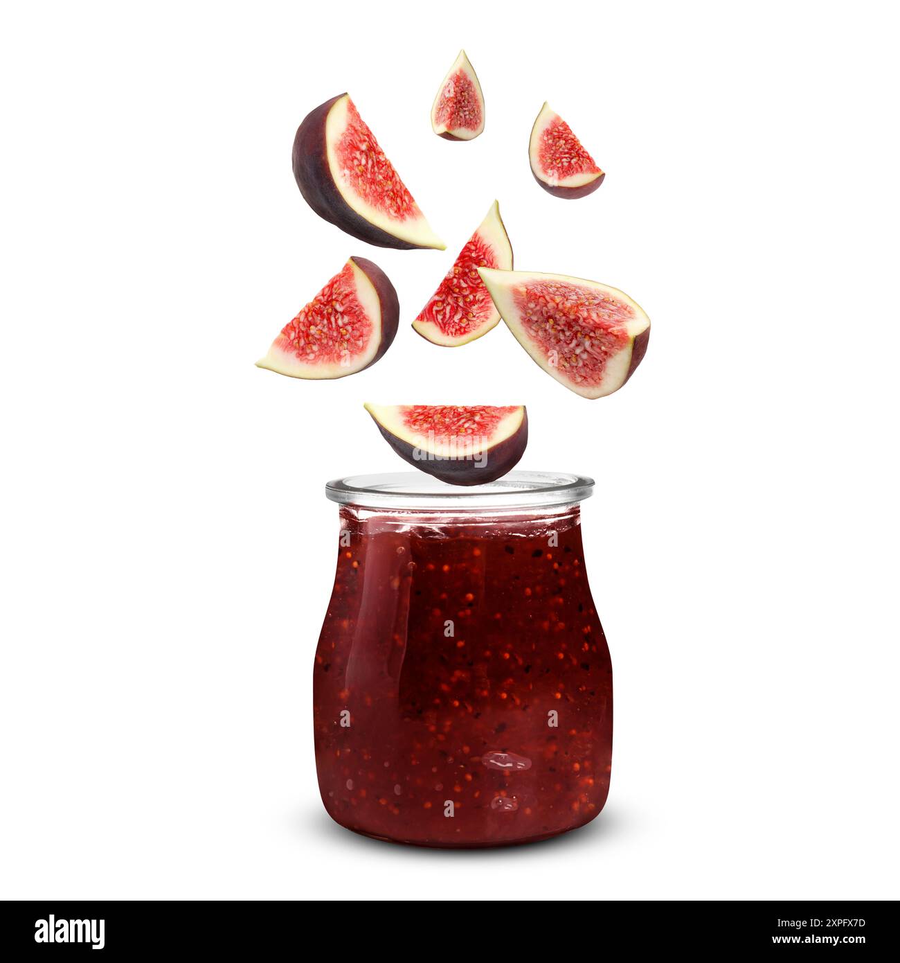 Fresh figs falling into jar with fruit jam on white background Stock ...