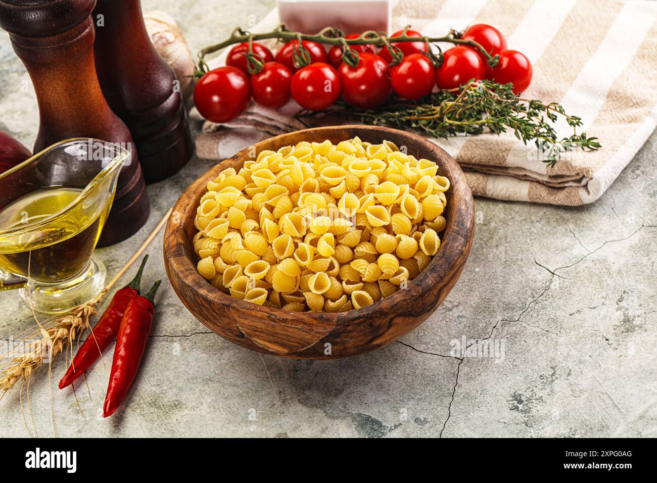 Italian cuisine - dry conchiglie shell pasta Stock Photo - Alamy