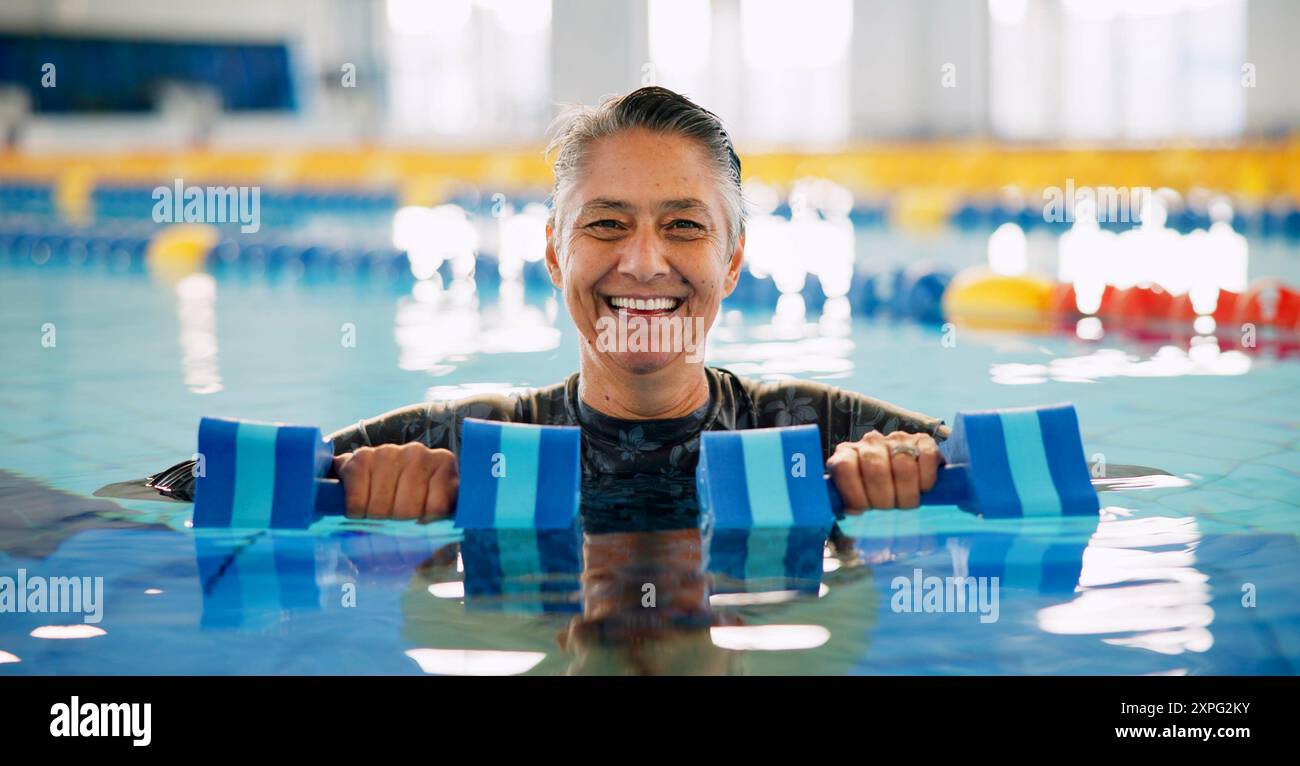 Dumbbell, portrait and mature woman in swimming pool for exercise ...