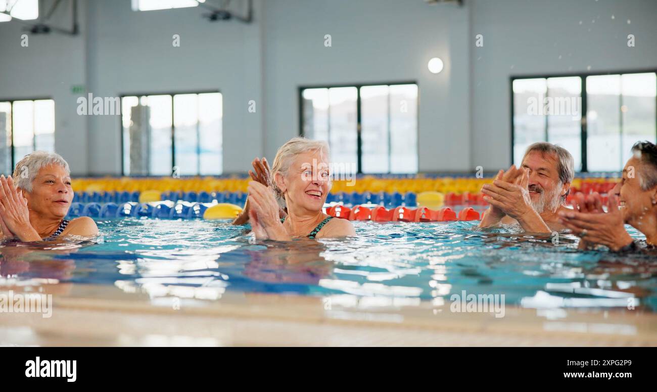 Swimming, physiotherapy and celebration with senior people in hydro ...