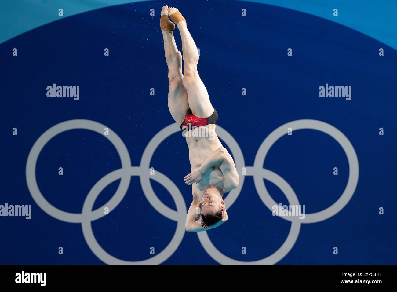 China's Xie Siyi competes in the men's 3m springboard diving ...