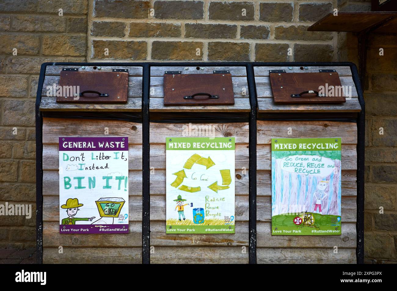 General waste bin and mixed recycling bins in an english countryside ...