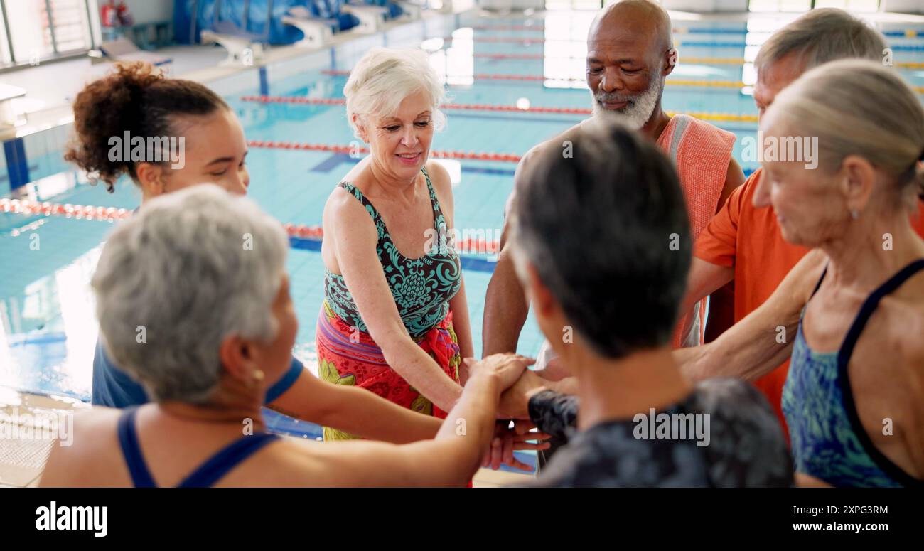 Swimming pool, senior people and huddle for learning, exercise and ...