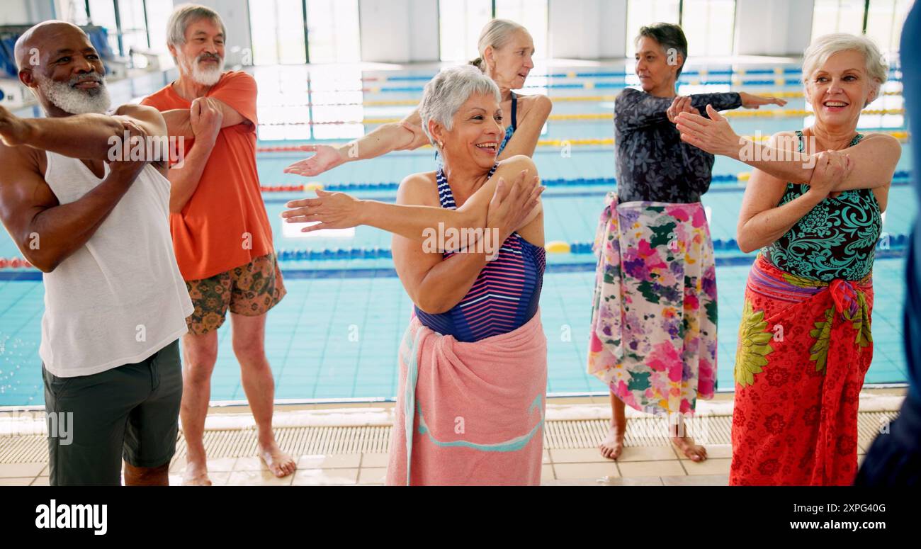 Swimming pool, senior people and warm up for learning, exercise and ...