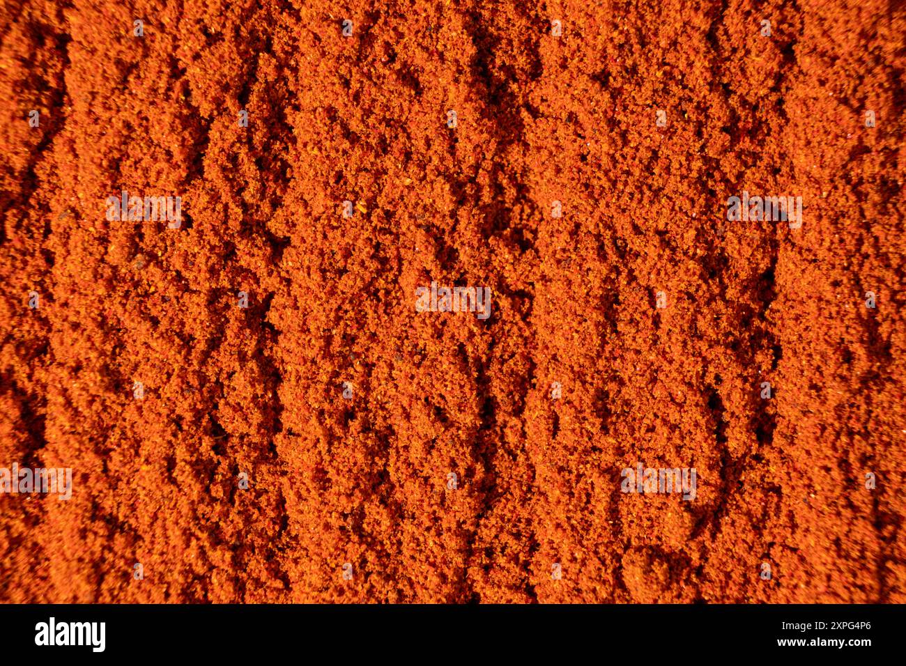 Ground paprika, red terracotta spice background, art in cooking Stock ...