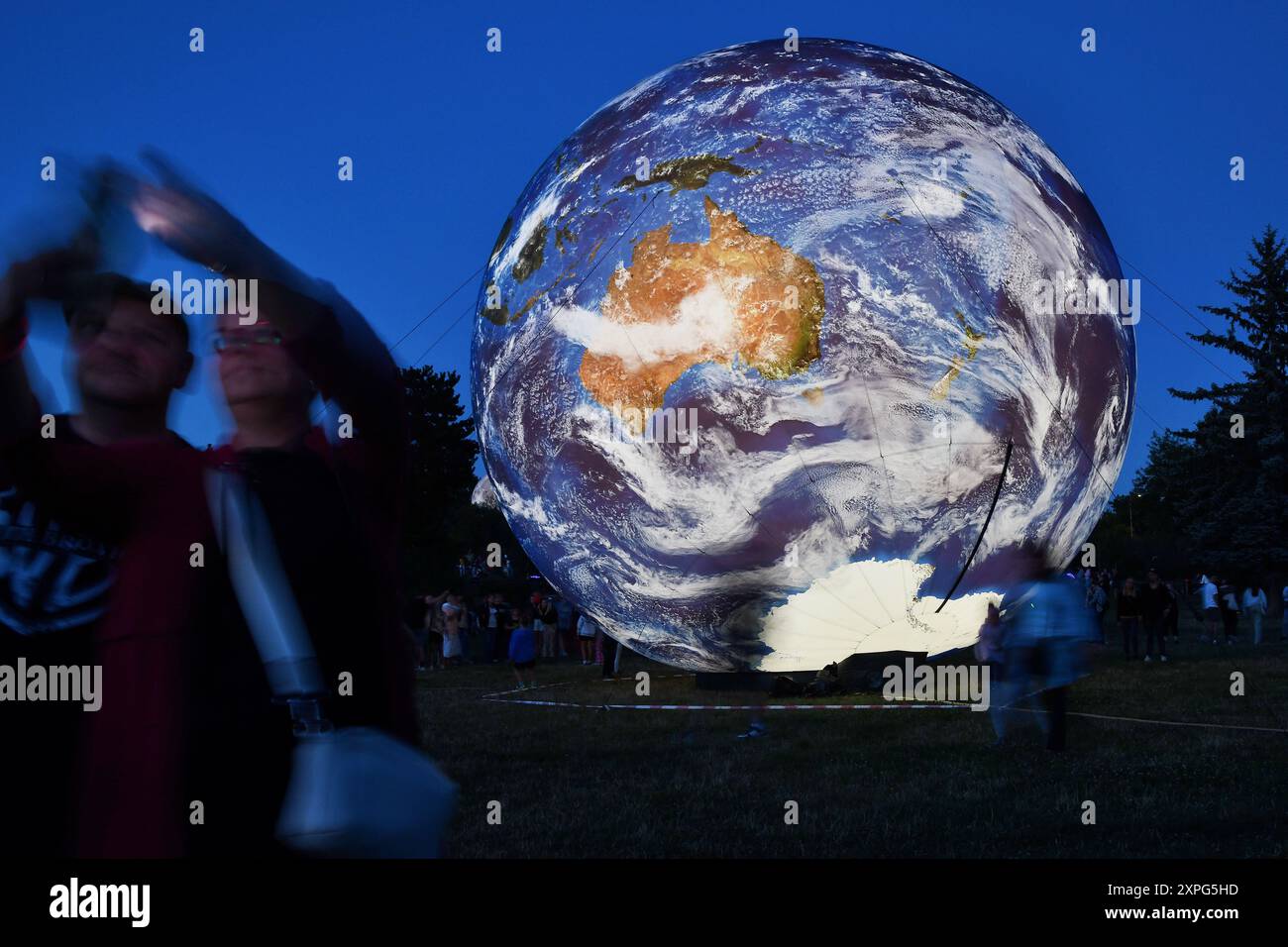 A giant inflatable model of planet Earth during the Planet Festival ...