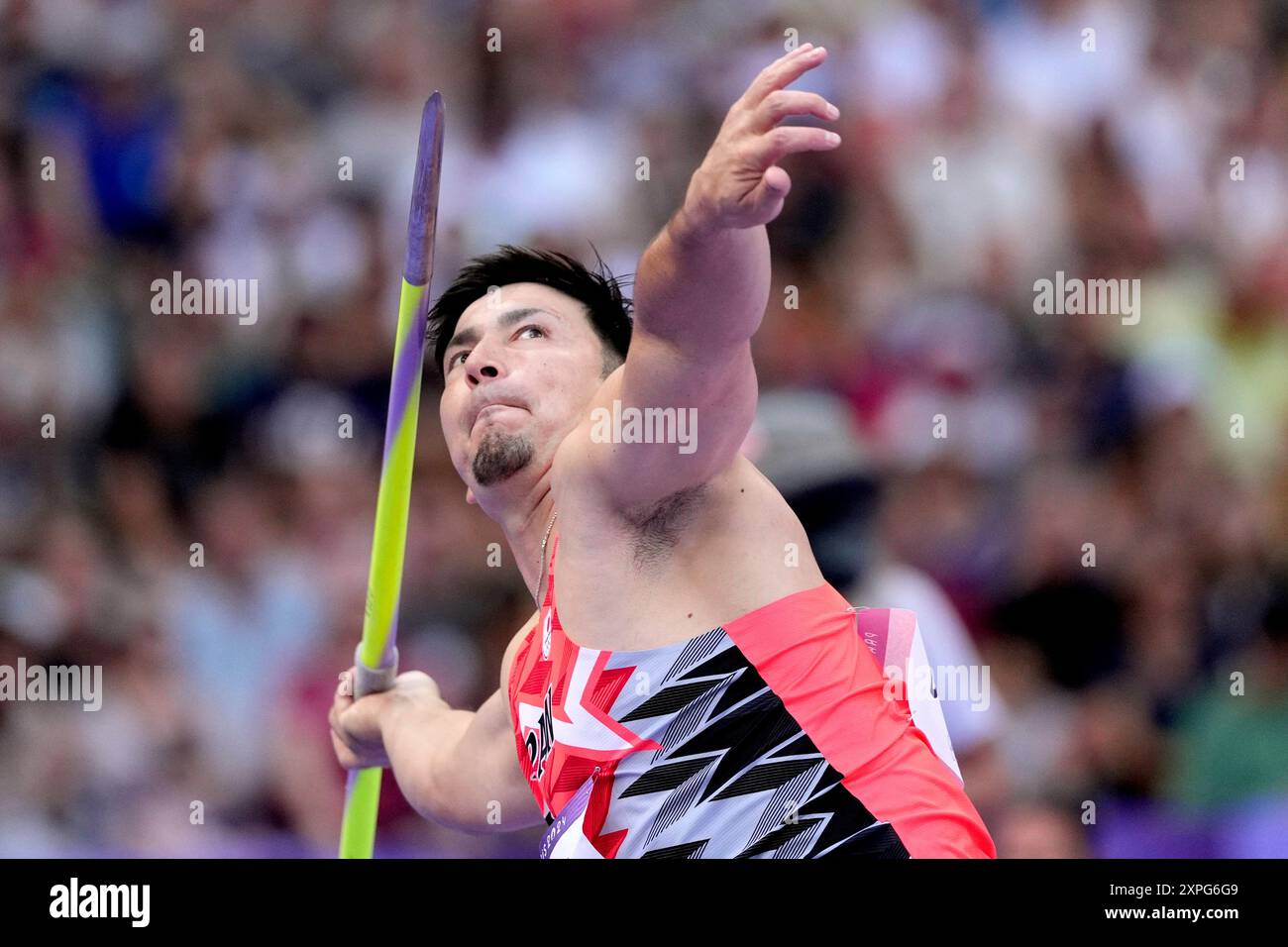 Roderick Genki Dean, of Japan, competes during the men's javelin throw ...