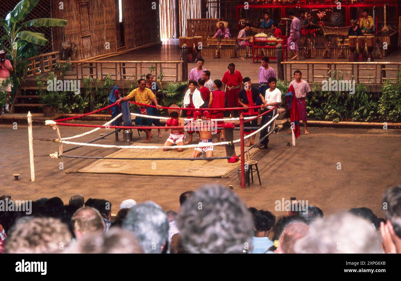Thai boxers kneel to offer respect prior to a demonstration of a Muay ...