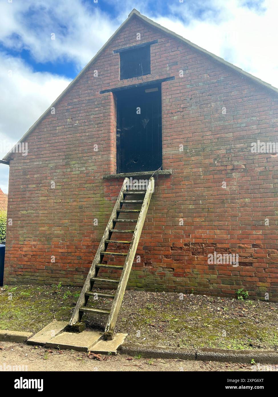 Wooden ladder leading to first floor hay loft in barn Stock Photo - Alamy