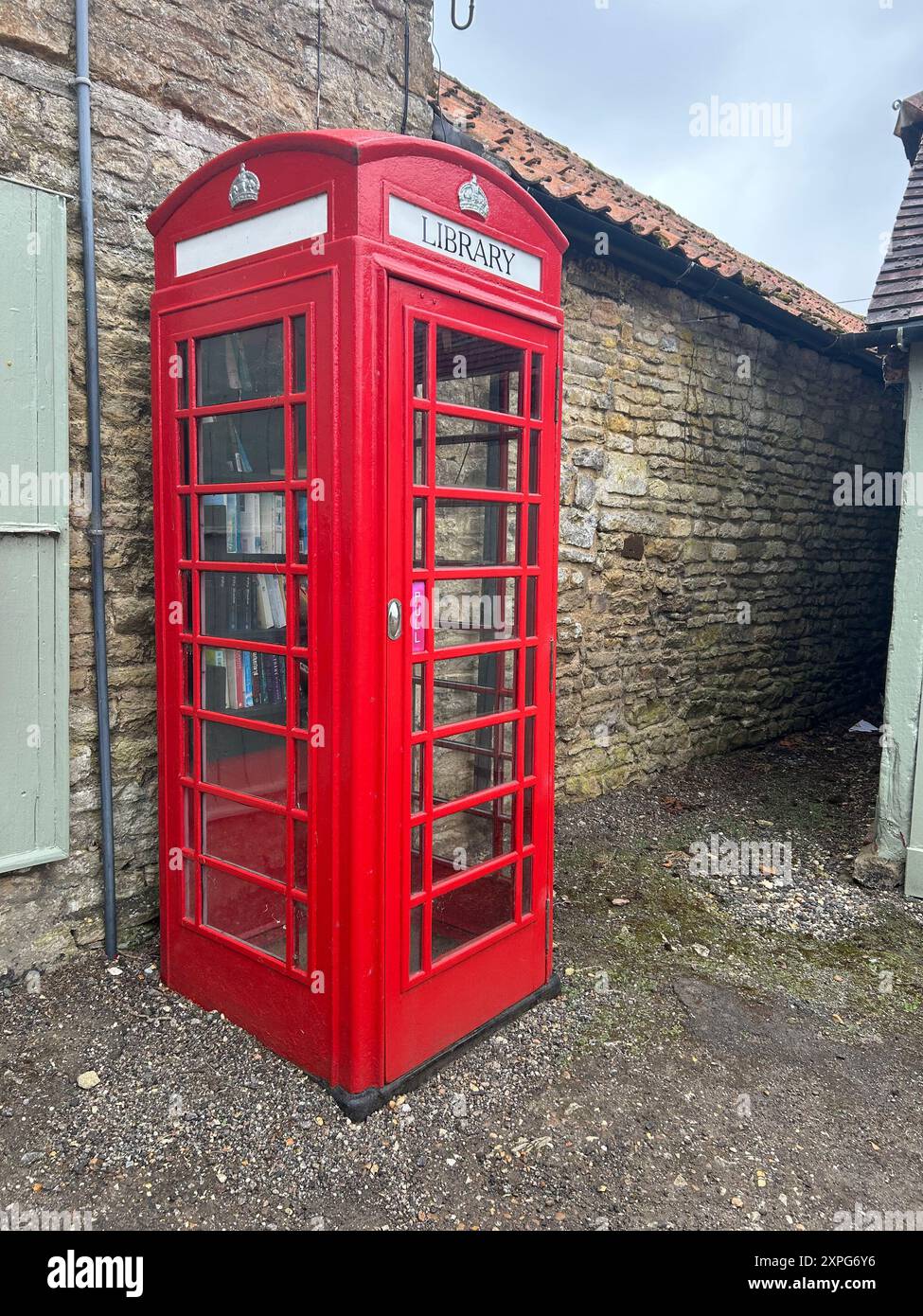 Red Victorian phone box converted into a Library in Castle Ashby ...