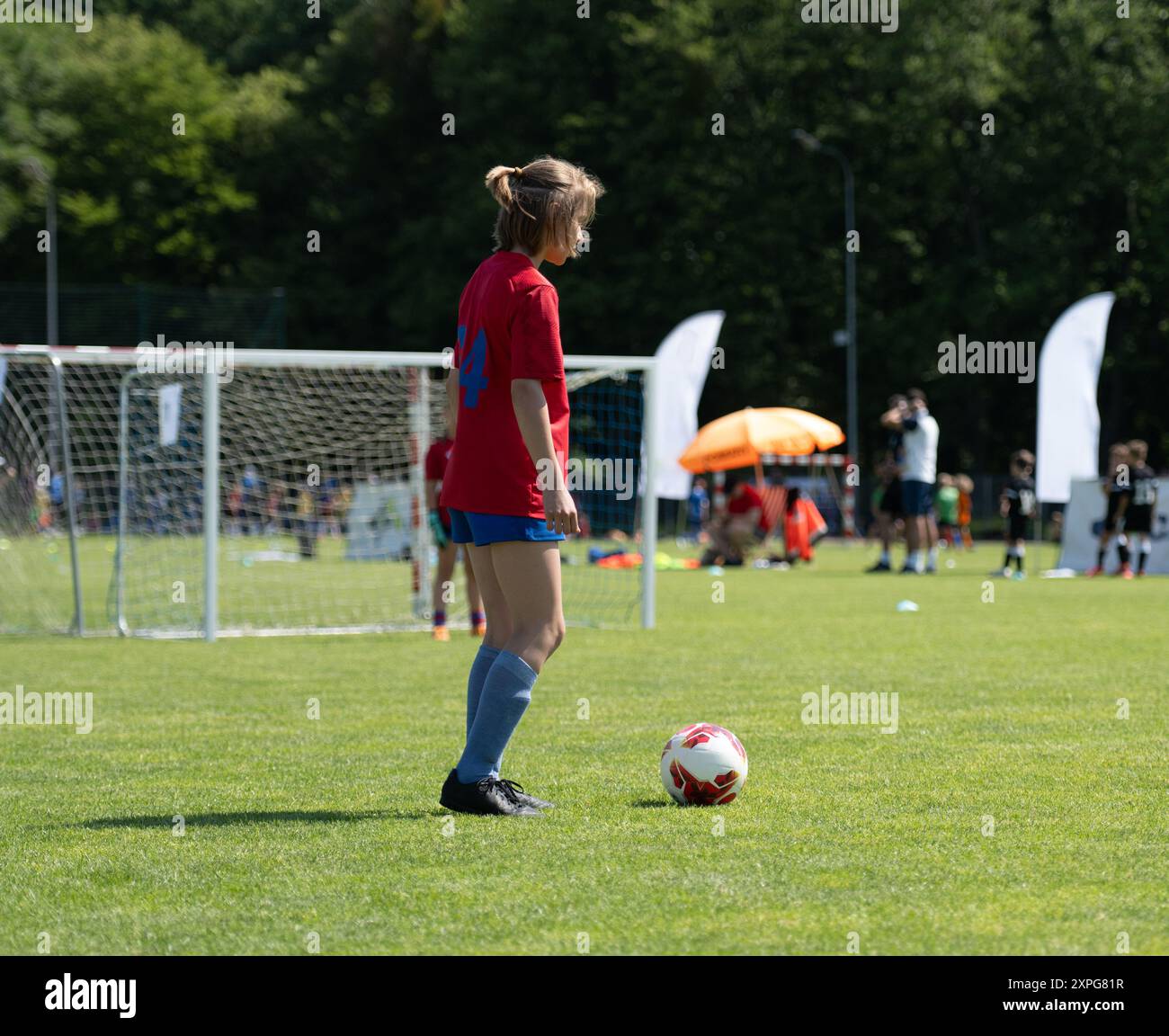 Small Footballer At Summer Match Shows Great Potential Stock Photo - Alamy