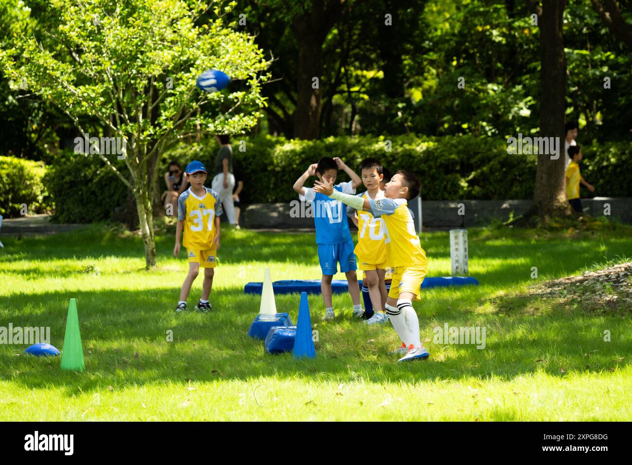 Football flying through air hi-res stock photography and images - Alamy