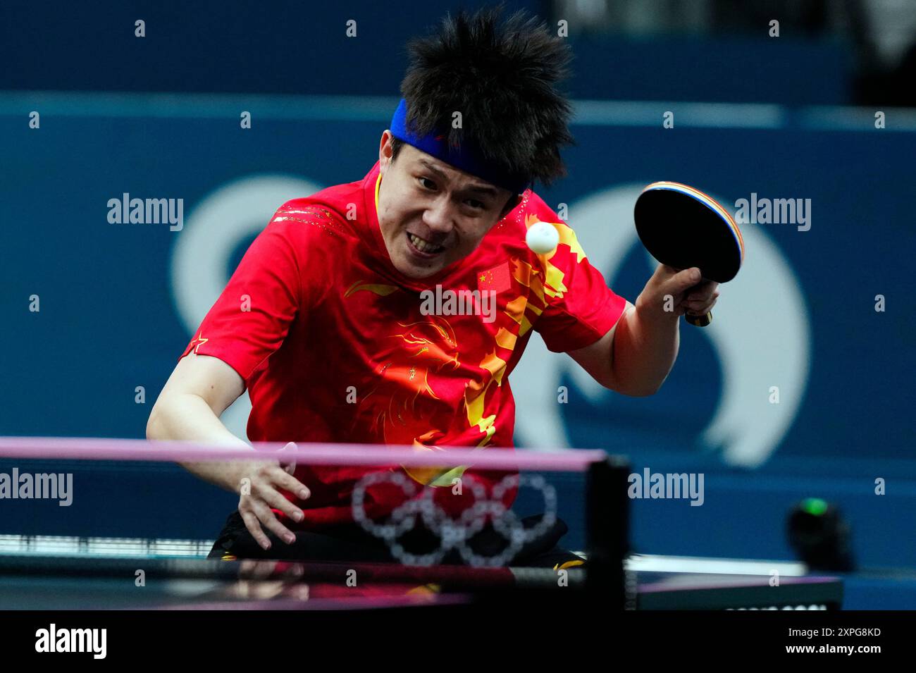 China's Wang Chuqin plays against India's Manav Vikash Thakkar during a ...