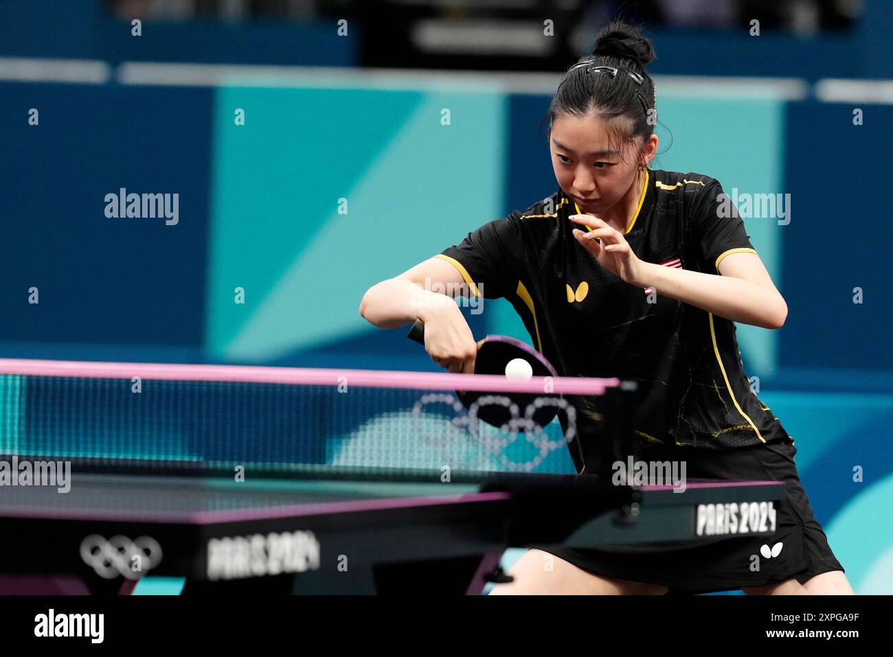 United States' Amy Wang plays against Germany's Xiaona Shan during a ...