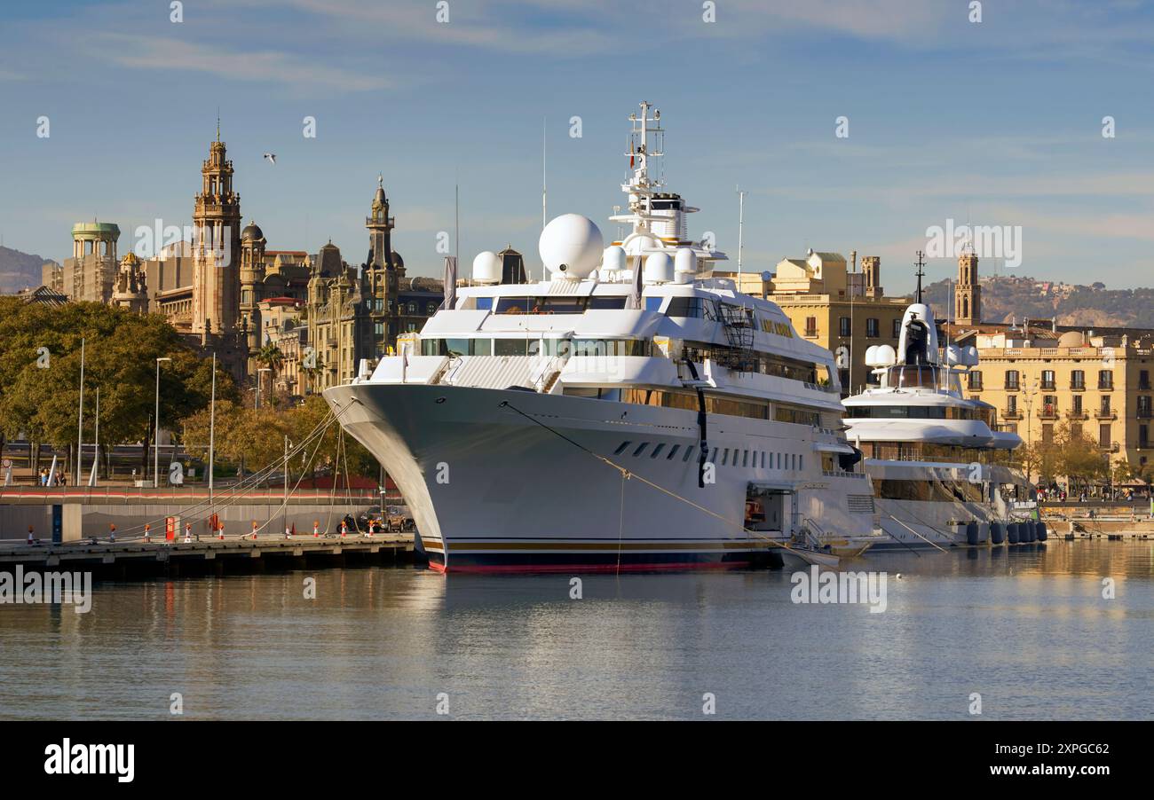 Big yachts in Barcelona city port Stock Photo - Alamy