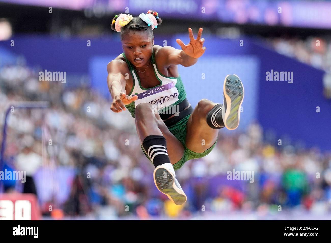 Prestina Oluchi Ochonogor, of Nigeria, competes during the women's long ...