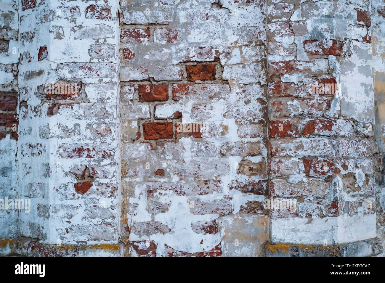 old brick wall texture with destroyed ruined plaster. Urban background ...