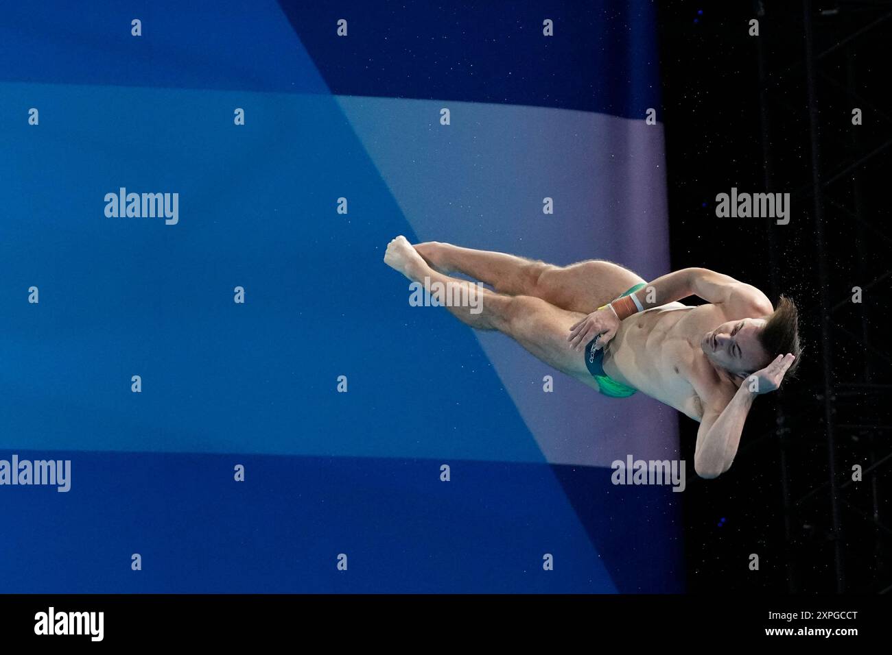 Australia's Kurtis Mathews competes in the men's 3m springboard diving ...