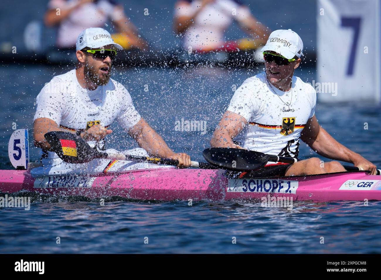 Germany's Jacob Schopf and Max Lemke react after competing in the men's ...