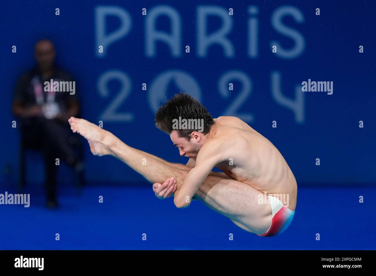 France's Jules Bouyer competes in the men's 3m springboard diving ...
