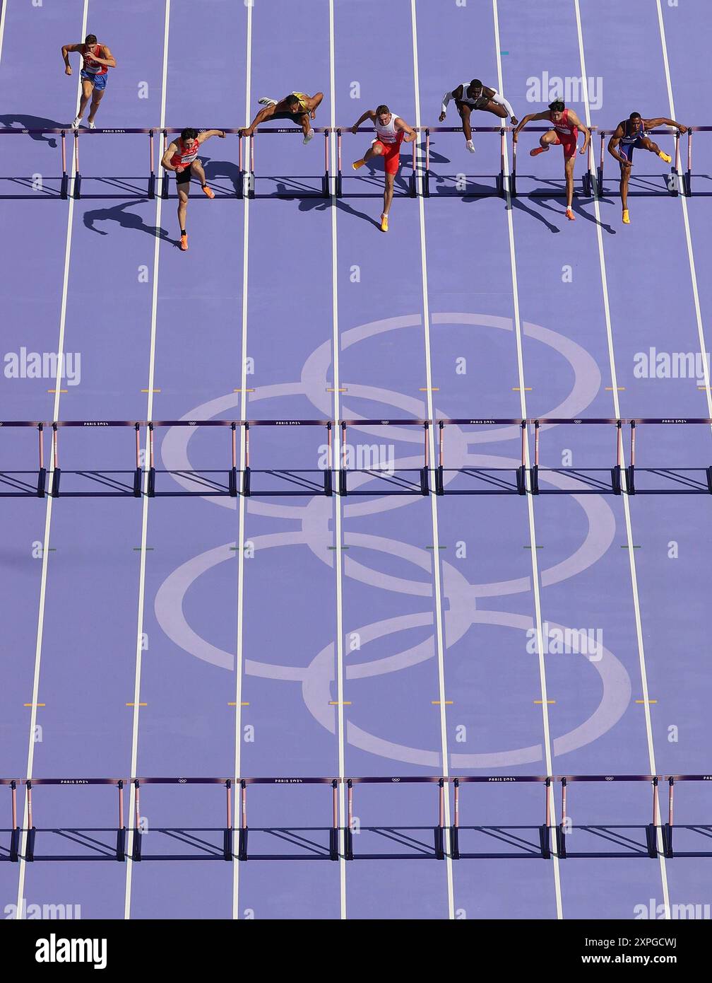 Paris, France. 6th Aug, 2024. Qin Weibo (2nd R) of China competes ...