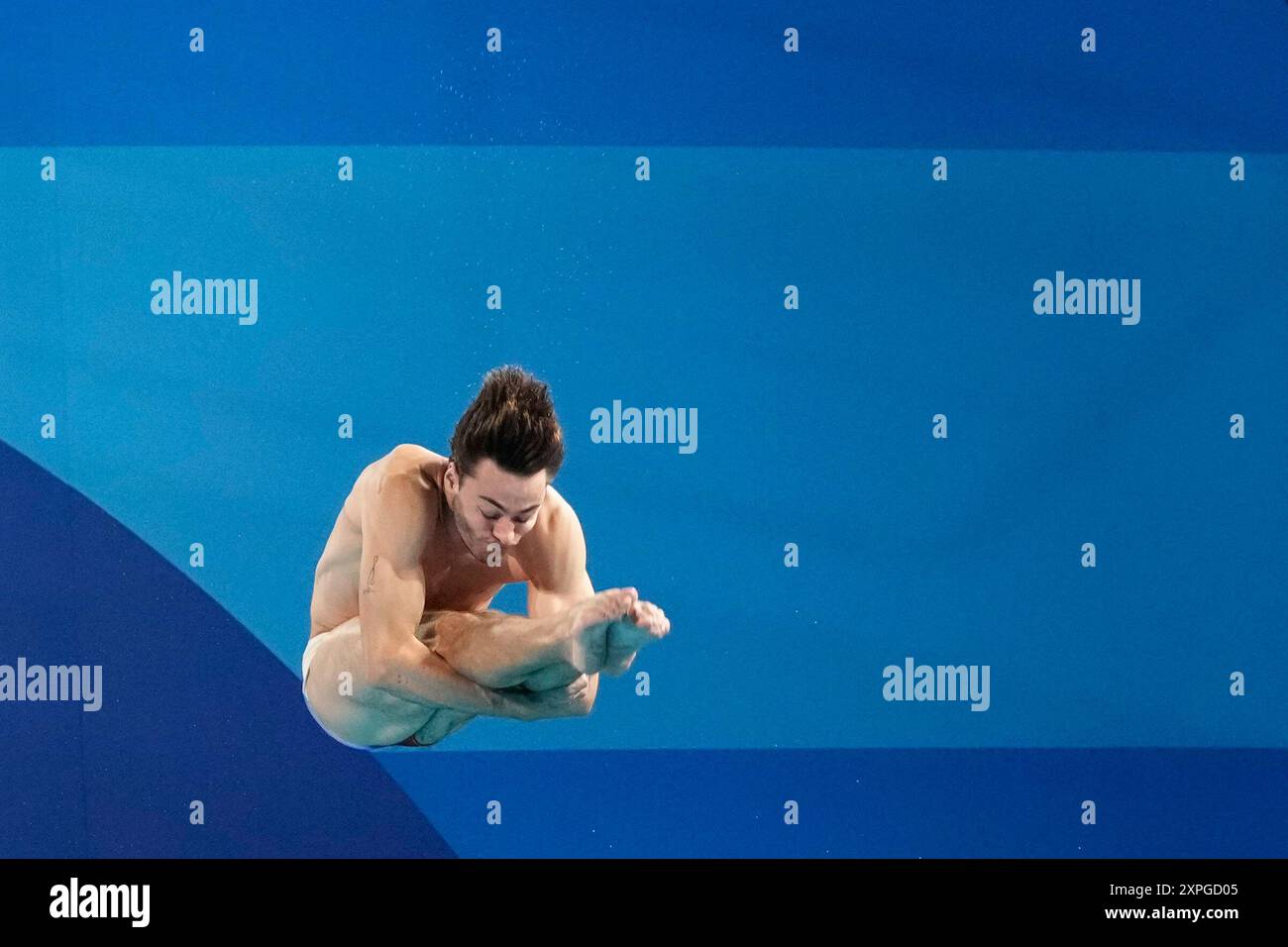 France's Jules Bouyer competes in the men's 3m springboard diving ...