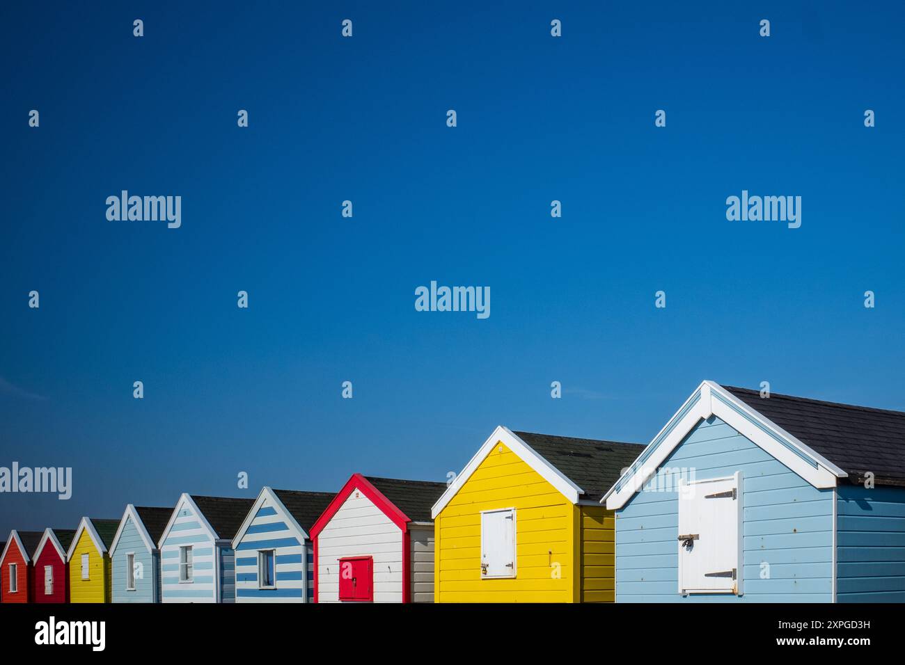 Colourful beach huts by Southwold beach, Suffolk, UK. Holidays, Seaside ...