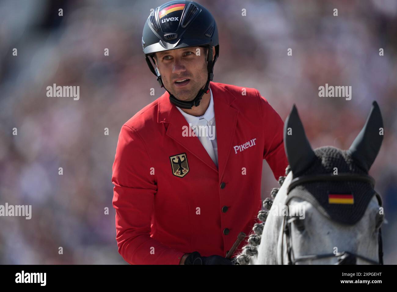 Germany's Christian Kukuk rides Checker 47 during the Jumping ...