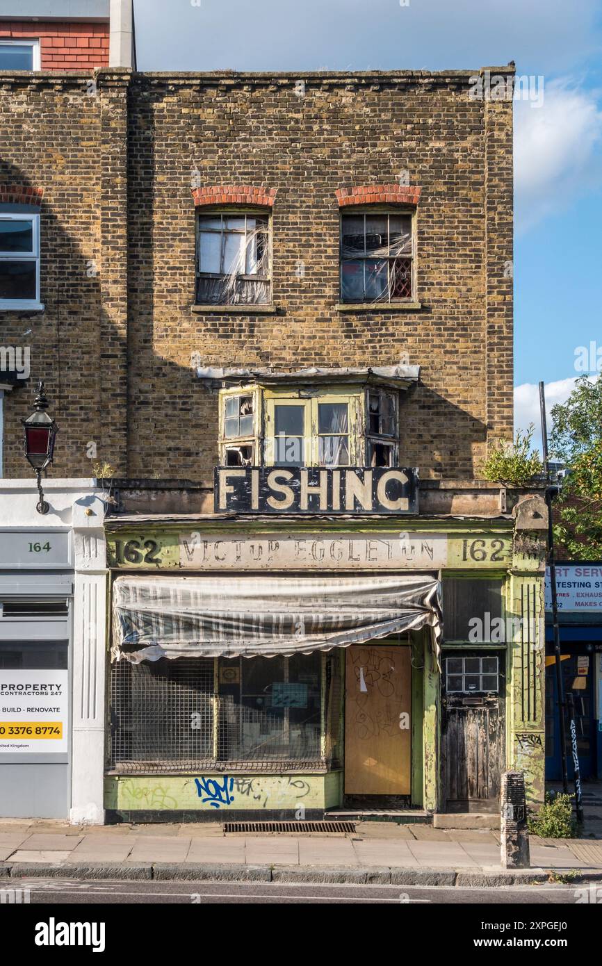 Sharp's Fishing Tackle, a dilapidated old shop front on Malden Road ...