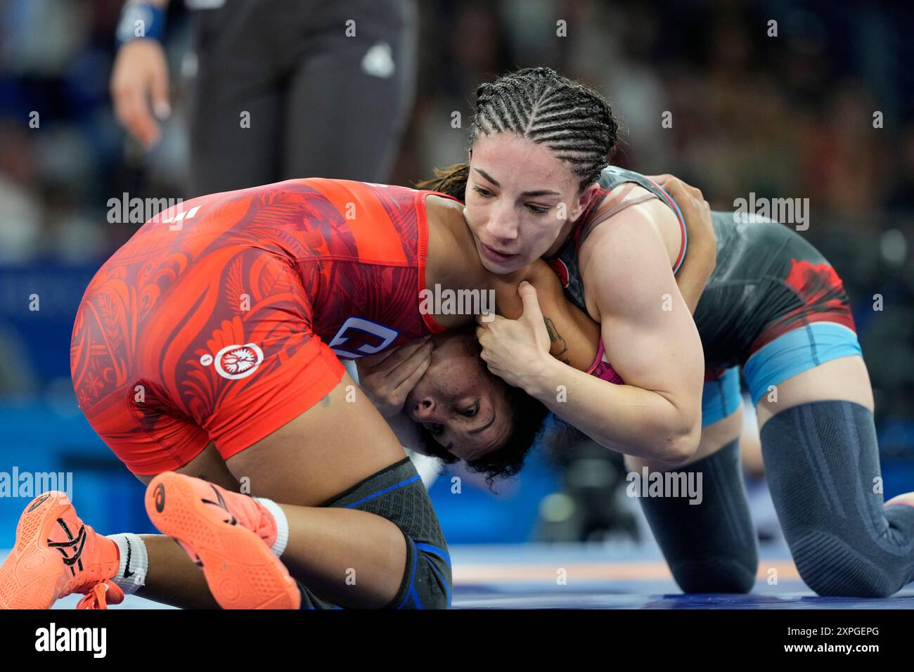 Cuba's Yusneylis Guzman and Turkey's Evin Demirhan Yavuz compete in the ...