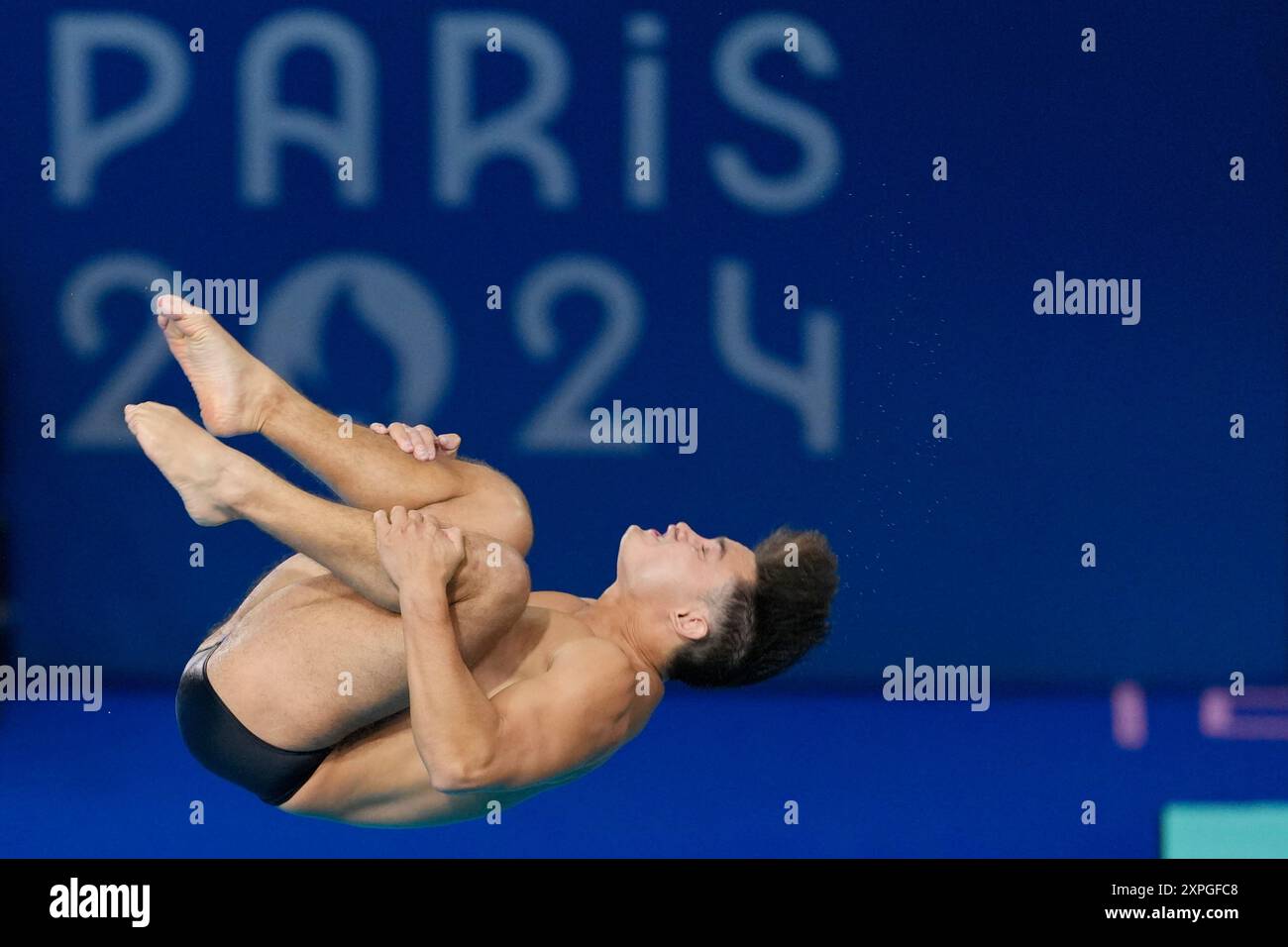 Colombia's Daniel Restrepo Garcia competes in the men's 3m springboard ...