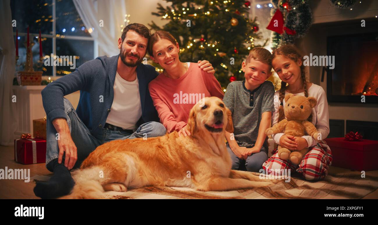 Holiday Portrait of a Loving Family Posing for Camera, Smiling and ...