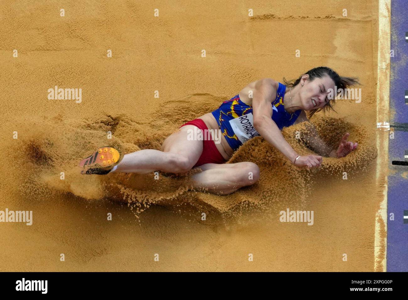 Alina Rotaru-Kottmann, of Romania, competes in the women's long jump ...